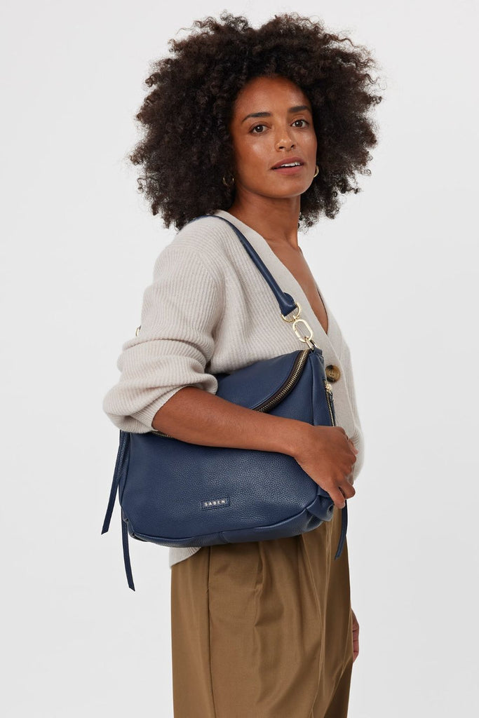 Shop Frankie Fold Over Midnight Blue Shoulder Bag | Flo & Frankie