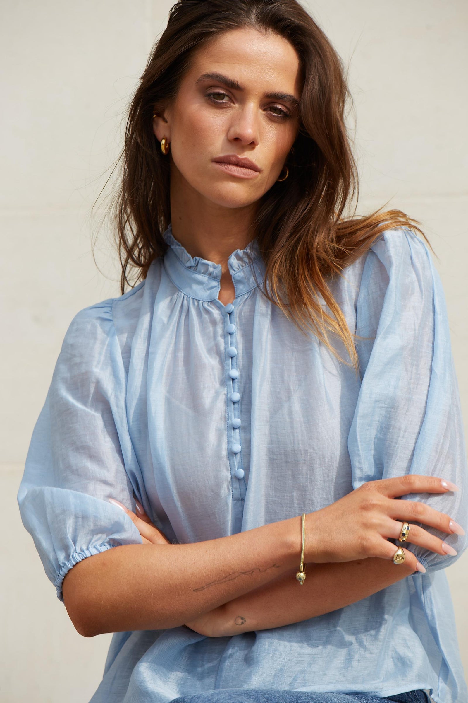 Shop Closure Pale Blue Sheer High Neck Buttoned SS Top | Flo & Frankie