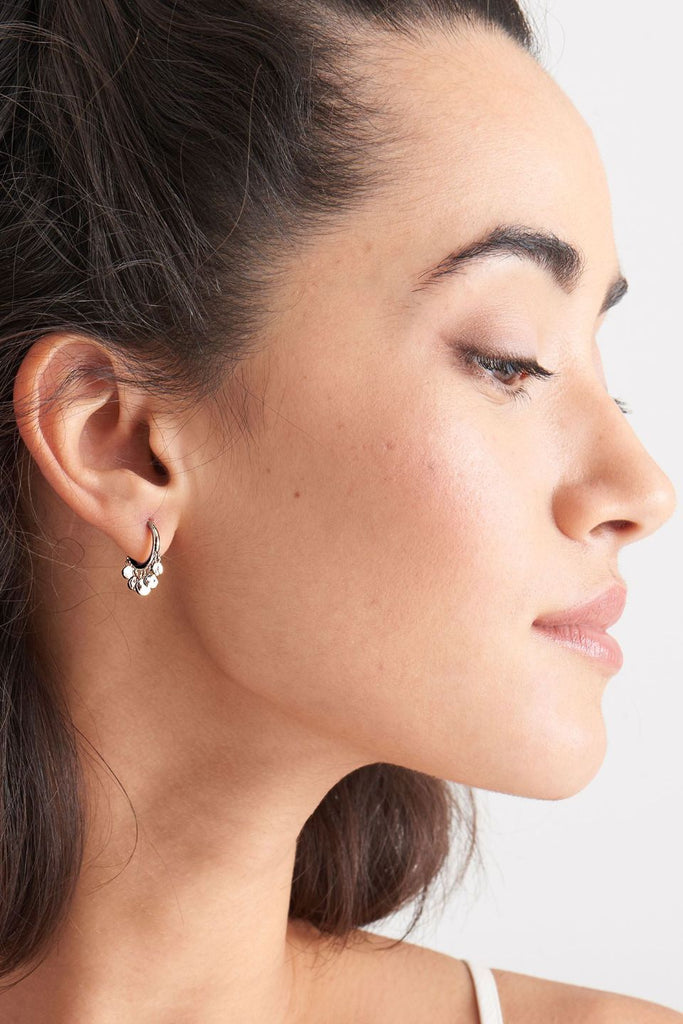 Shop Ear We Go Mini Hanging Disc Silver Huggie Hoops Earrings | Flo